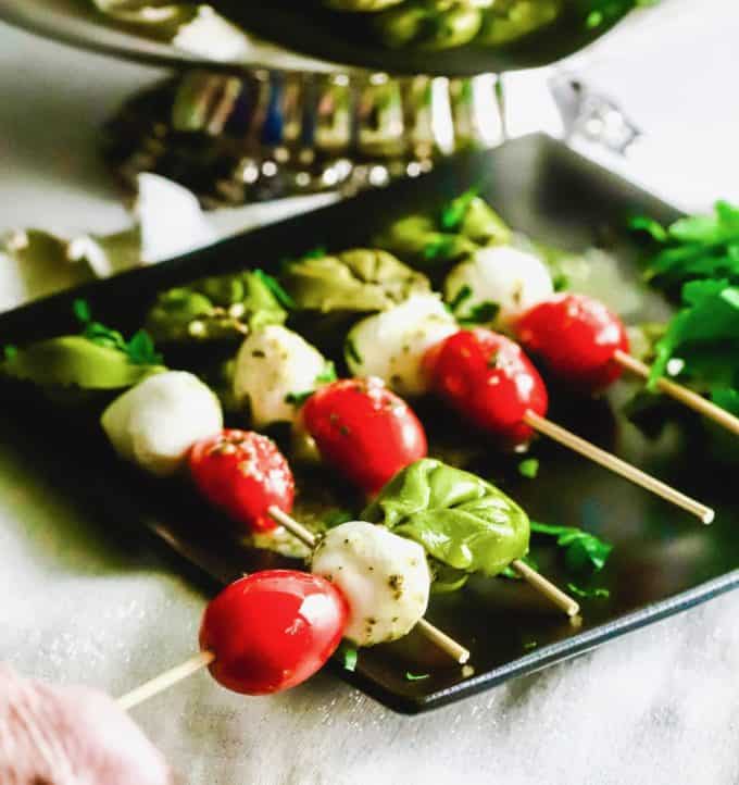 Easy Caprese Skewers with Pesto Dressing | gritsandpinecones.com